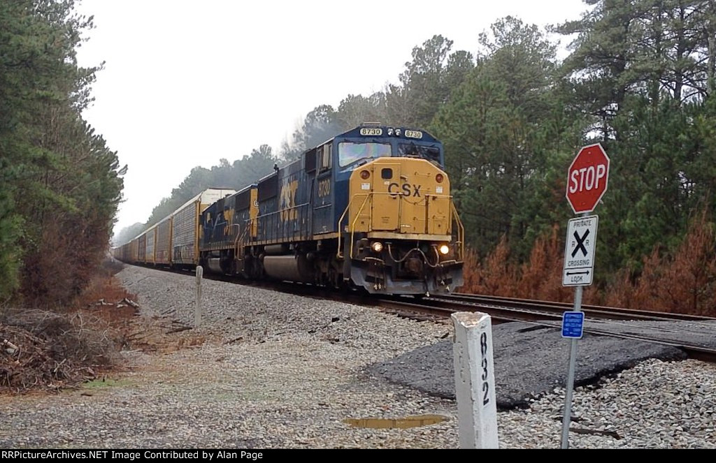 CSX SD60I 8730 and SD50-2 8524 rush empty autoracks NB